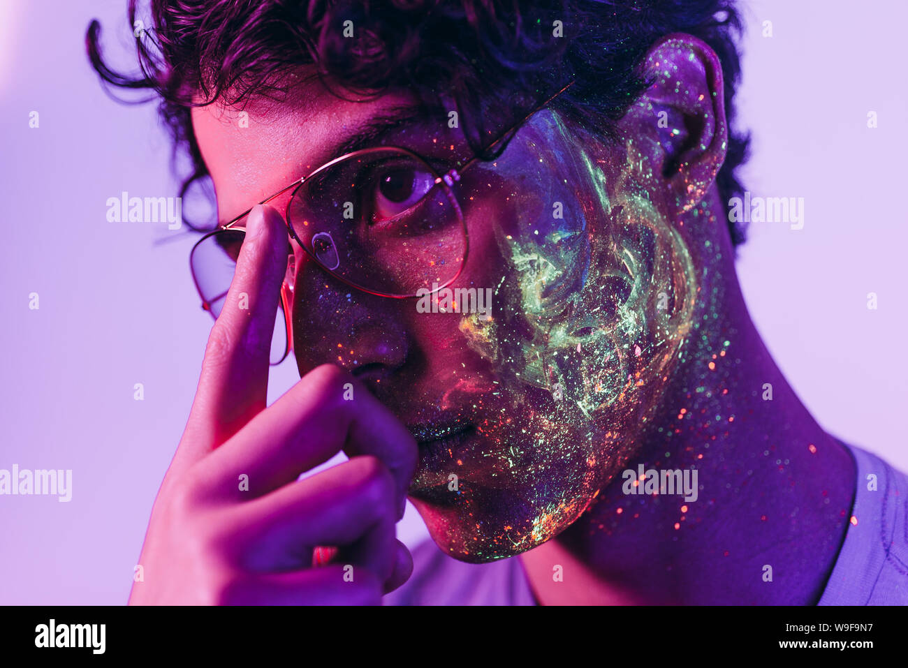 Teen boy neon light hi-res stock photography and images - Alamy