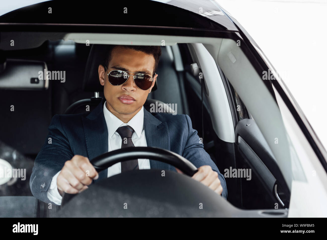 African american suit in car hi-res stock photography and images - Alamy