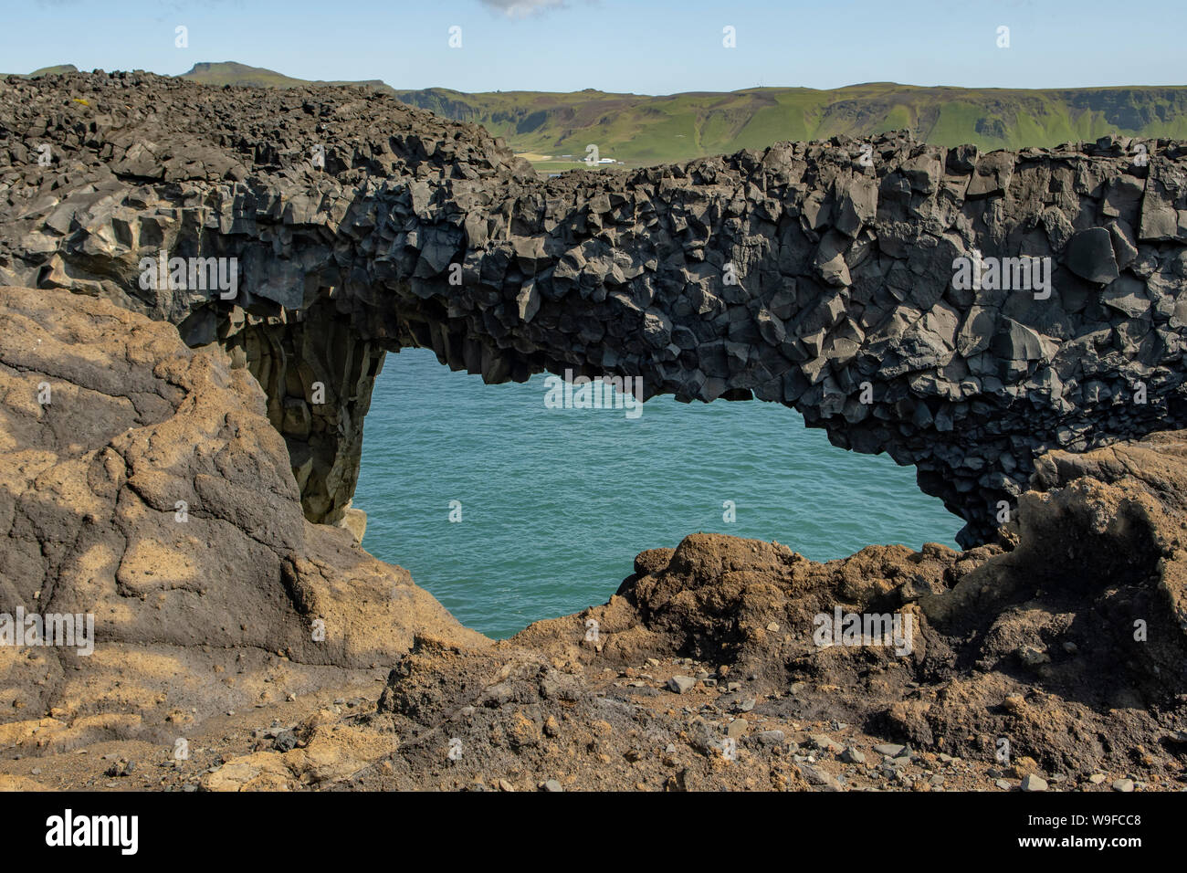 Small Arch at Dyrhoelay, Iceland Stock Photo - Alamy