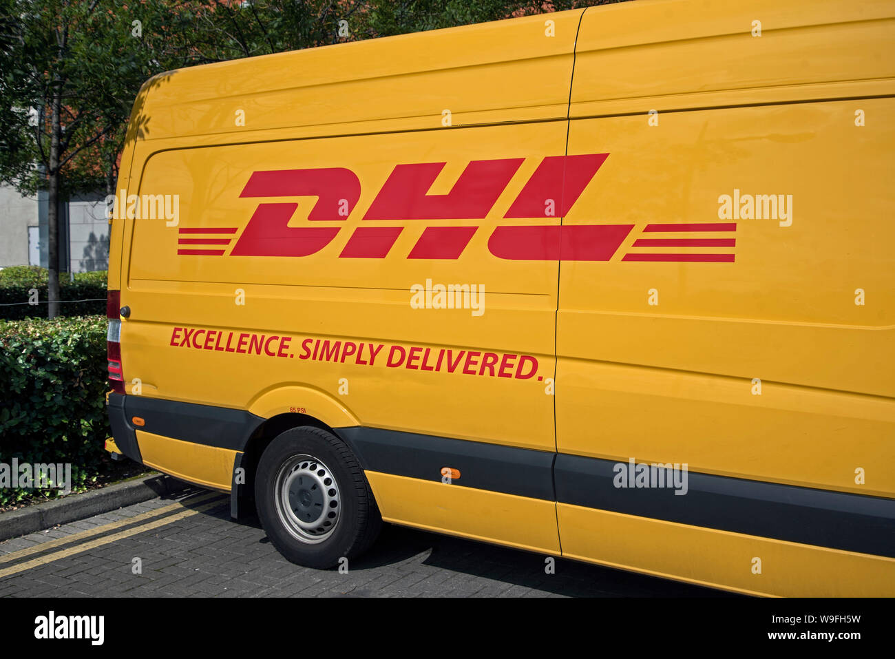 DHL delivery van parked on a street in Edinburgh, Scotland, UK Stock ...