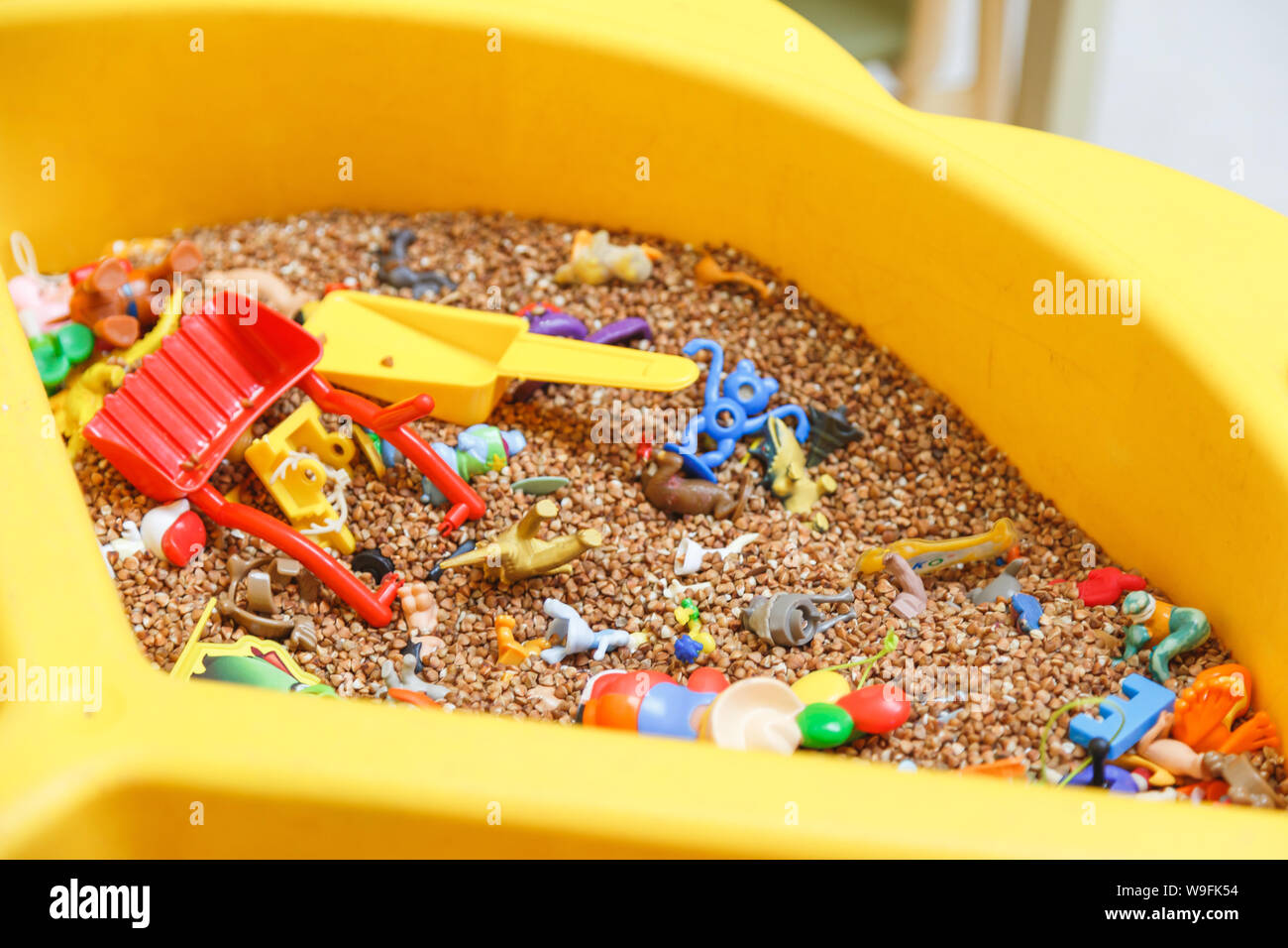 Kids toys and buckwheat for development of fine motor concept Stock ...
