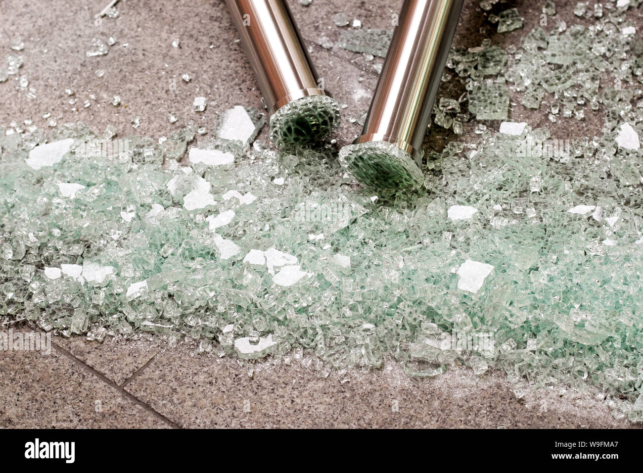 Big pile of scattered glass after destruction damage Stock Photo - Alamy