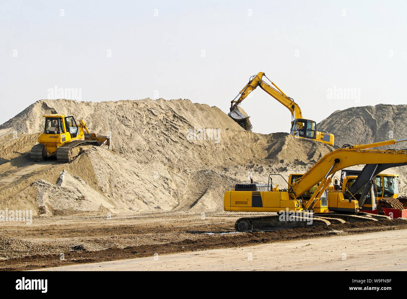 Heavy machinery equipment at road construction site Stock Photo - Alamy