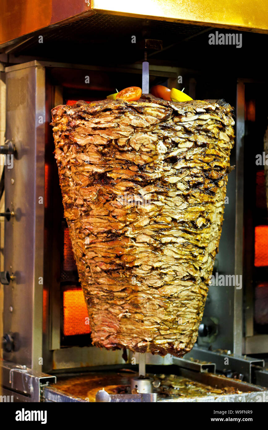 Traditional Greek cuisine gyros meat at grill Stock Photo - Alamy