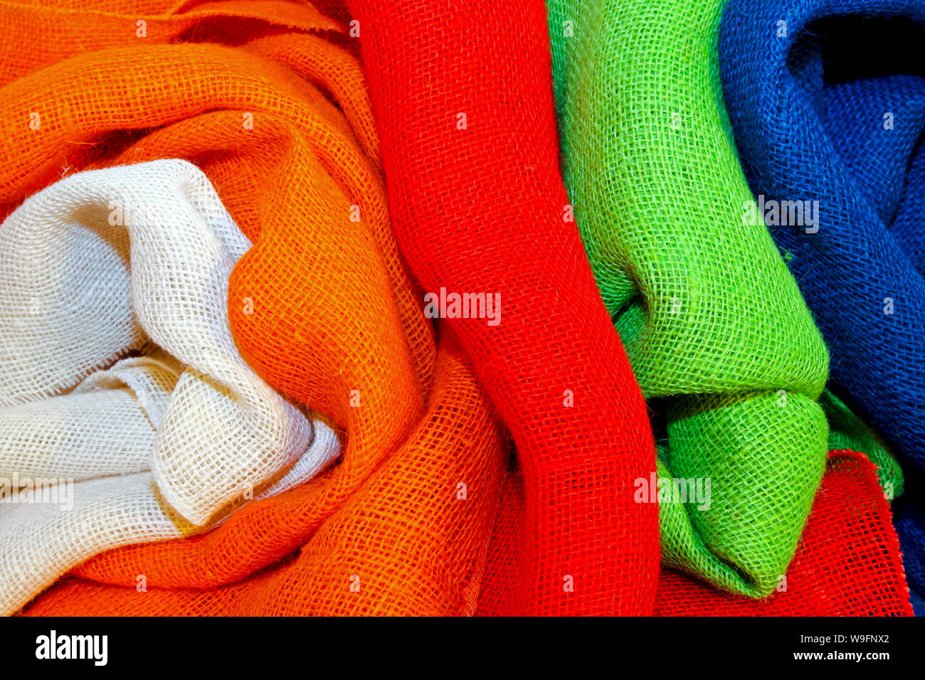 Wrinkled sack cloth in vivid colors assortment Stock Photo - Alamy