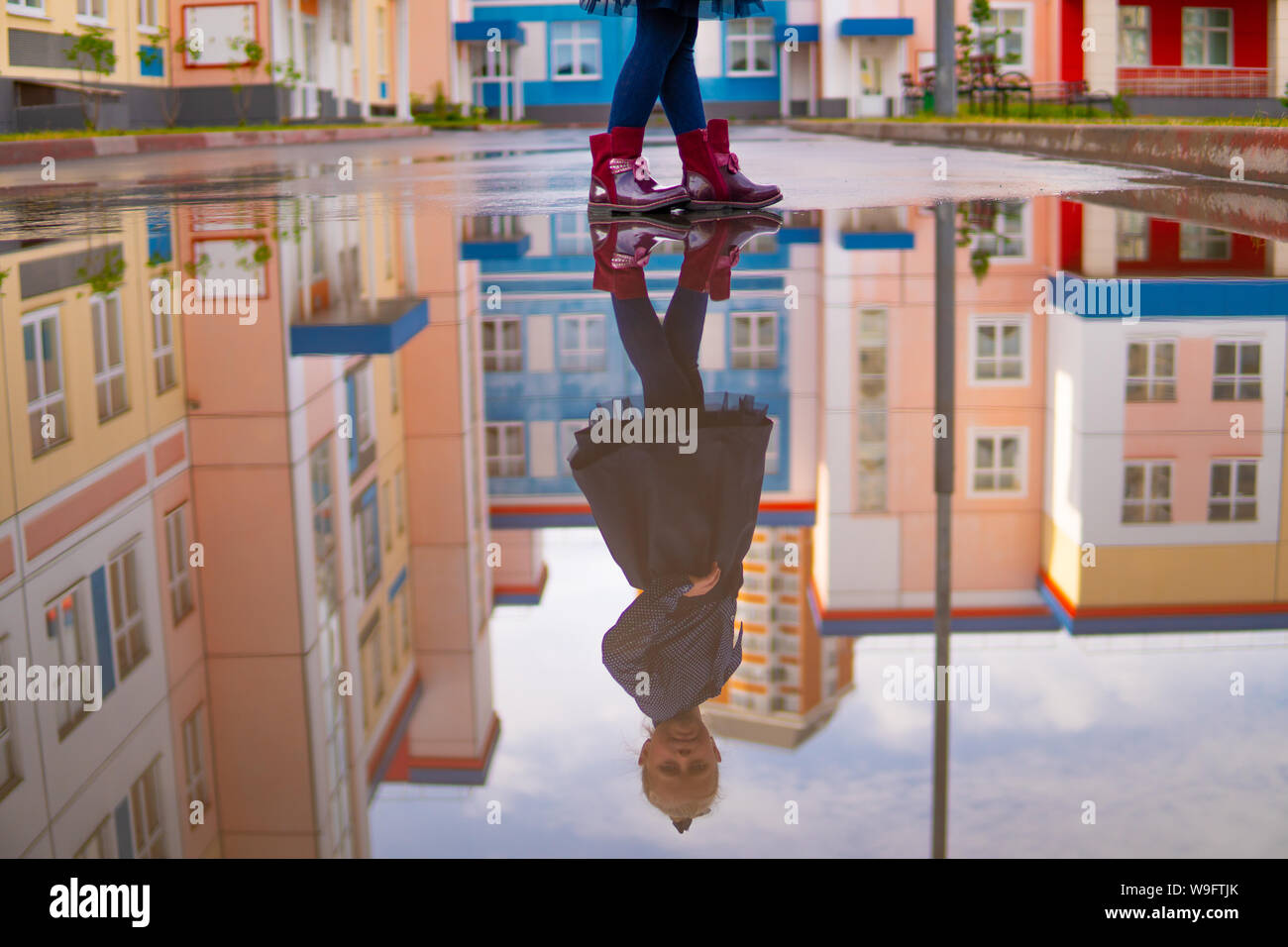 Reflection woman puddle city hi-res stock photography and images - Alamy