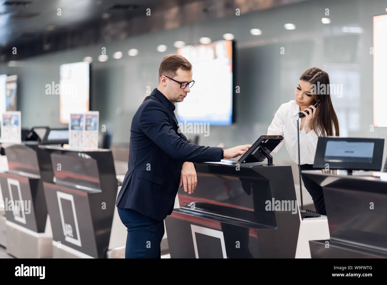 Person handing over passport hi-res stock photography and images - Alamy