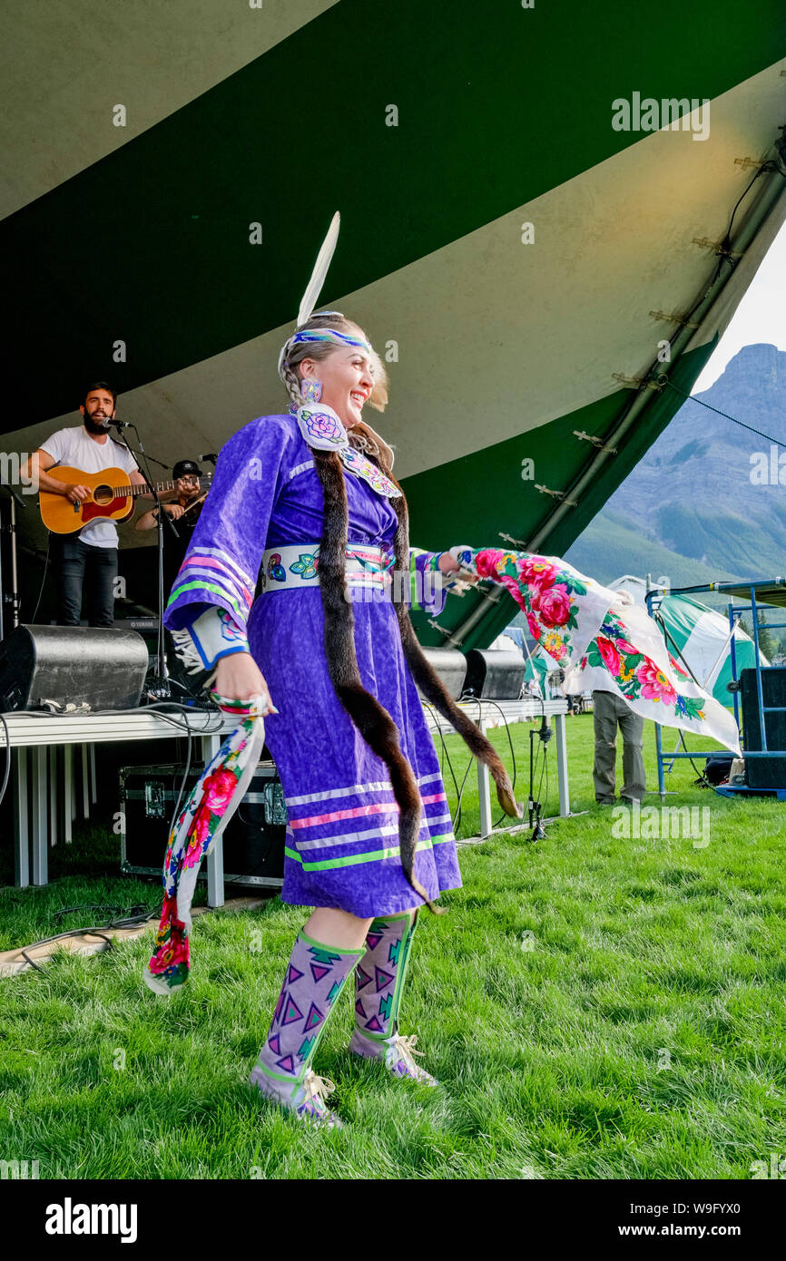 Female Indigenous dancer, dances while Michael Bernard Fitzgerald plays ...