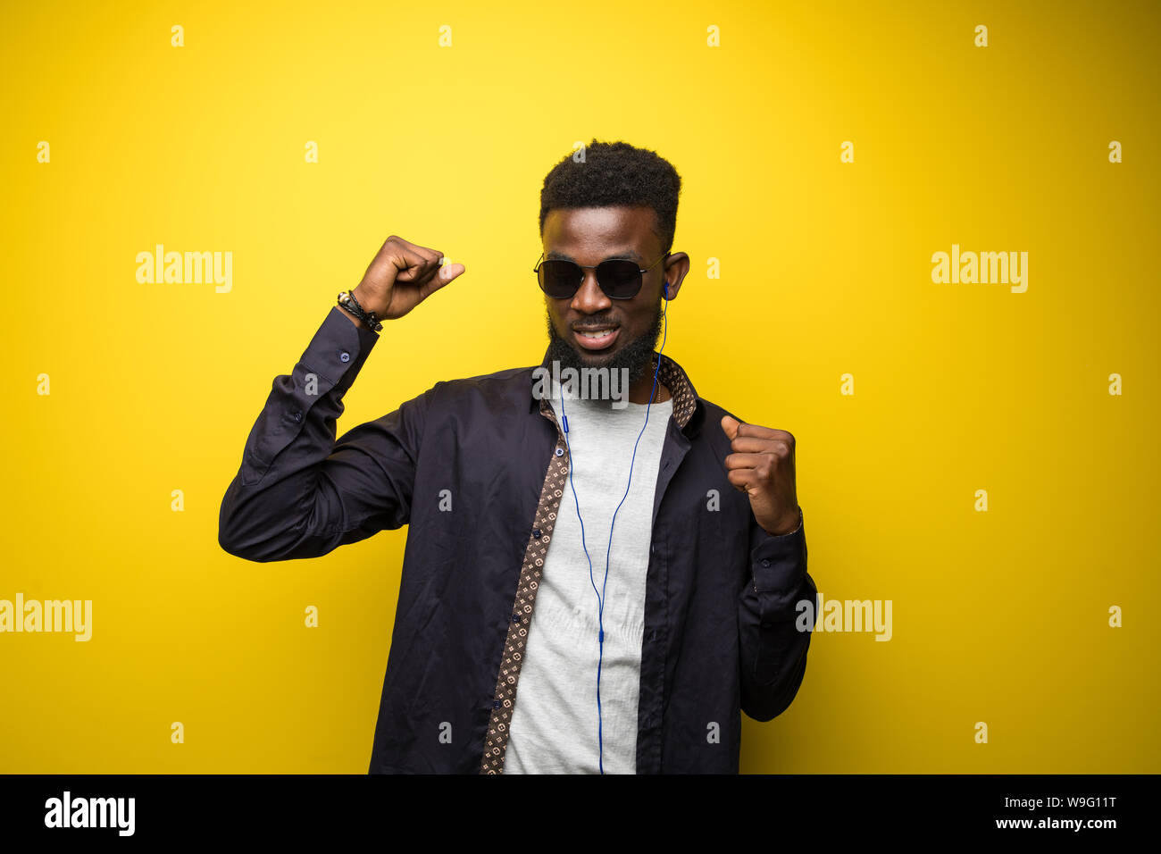 Male african triumphant fist hi-res stock photography and images - Alamy