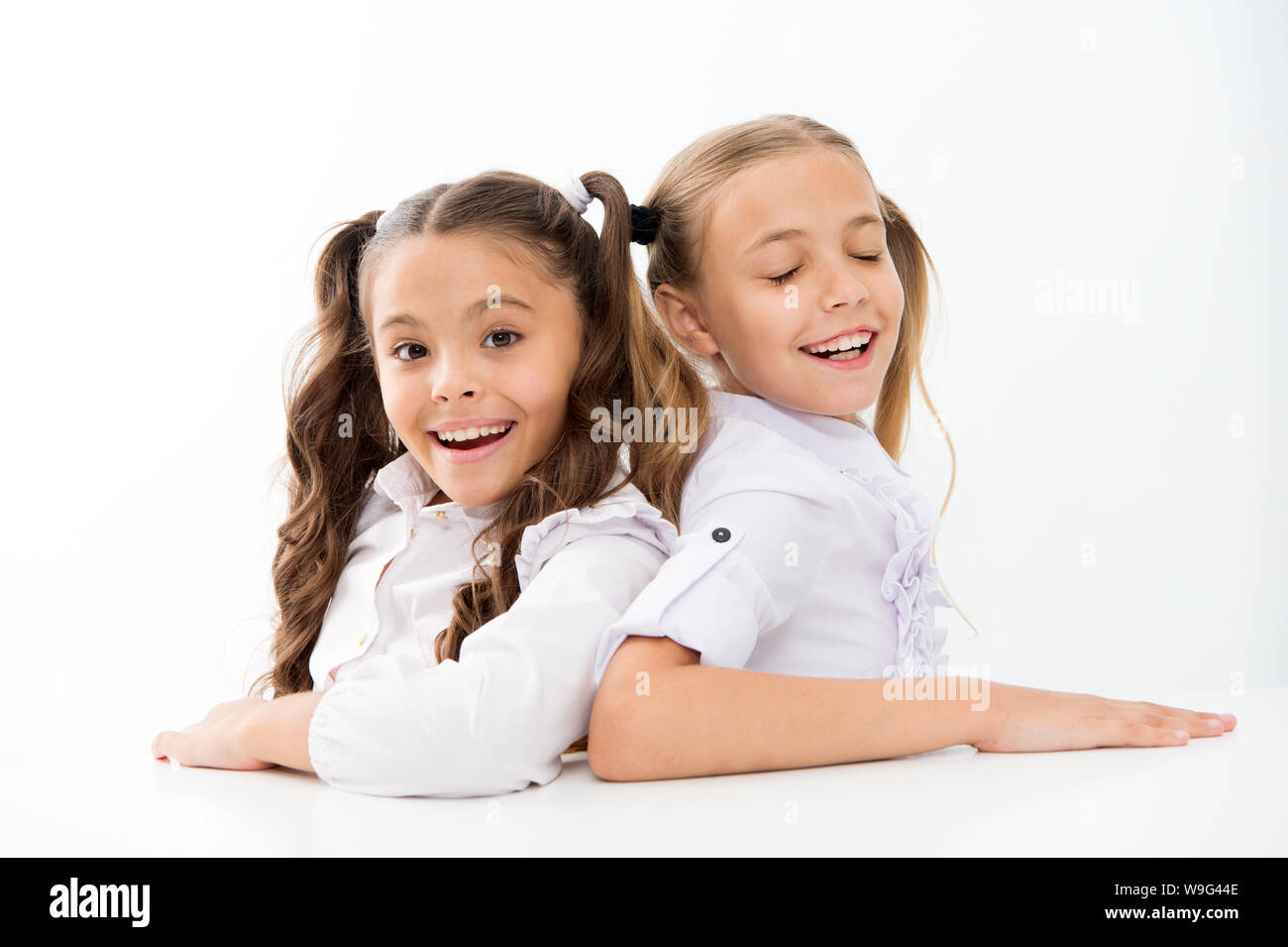 Happy childhood. Adorable schoolgirls. Back to school. Education ...