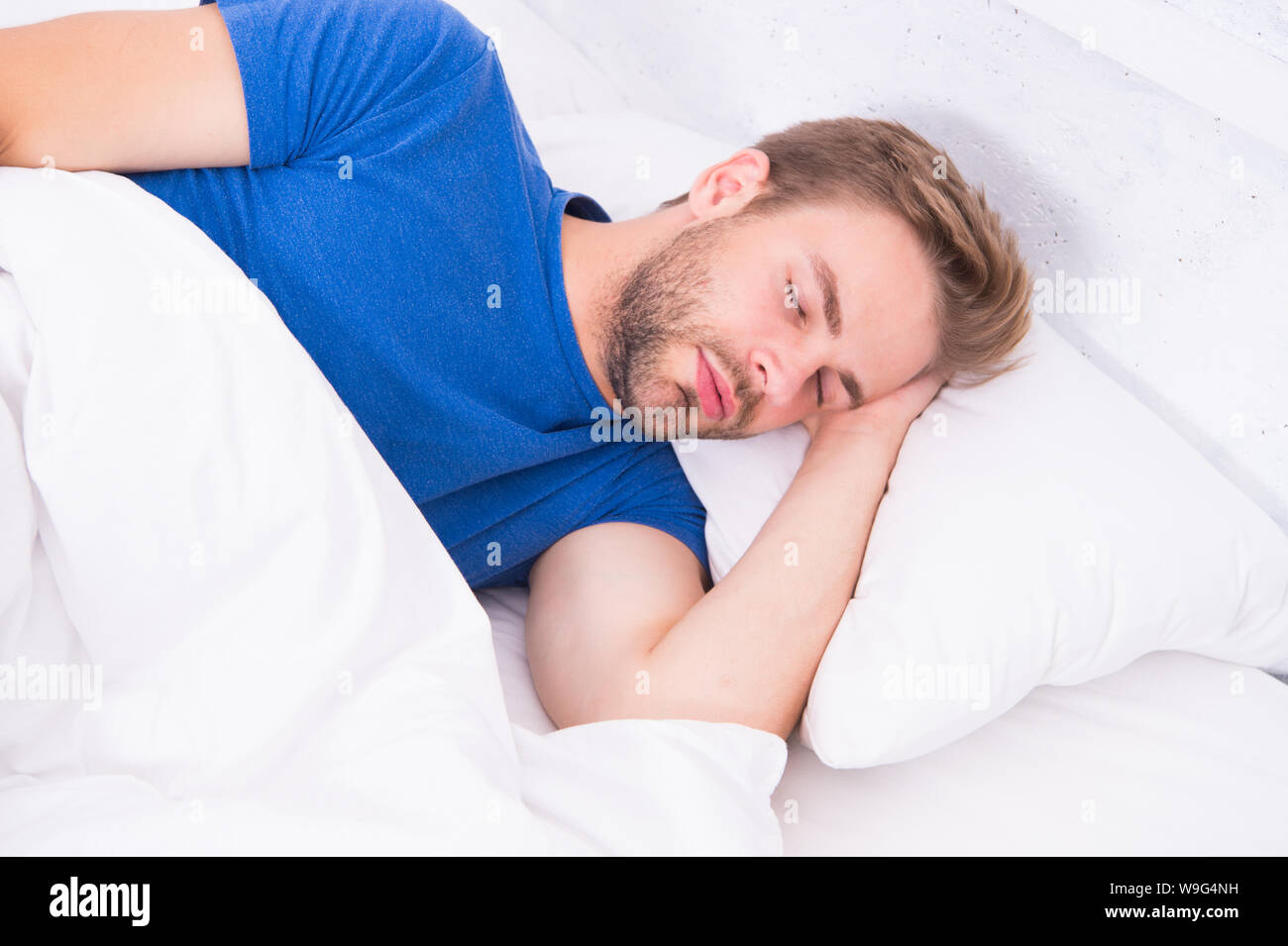 Tips sleeping better. Man handsome guy sleeping. Get enough amount of ...