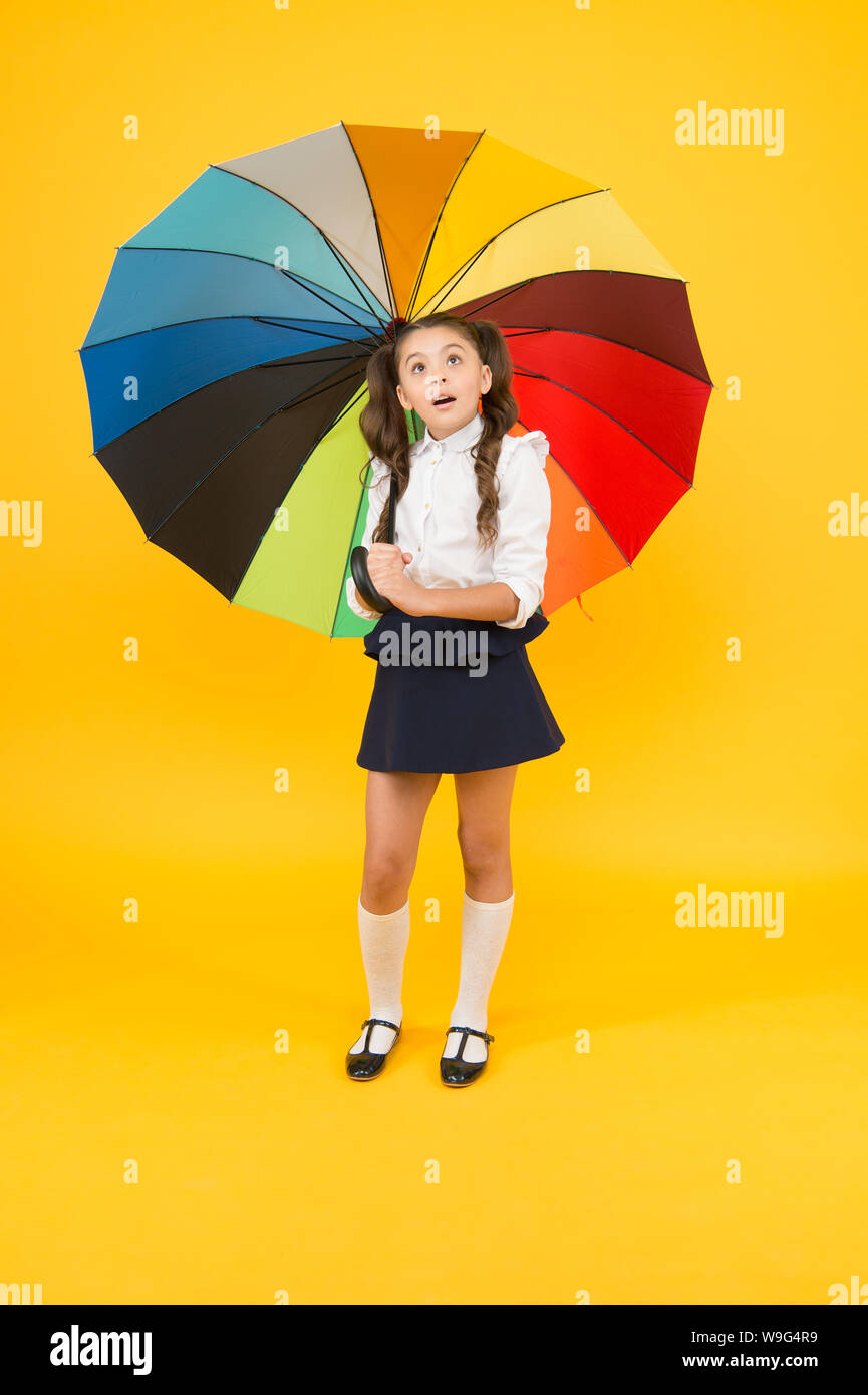 On way to school. Fashion accessory. Rainy september. Accessory for rainy day. Fancy schoolgirl ...