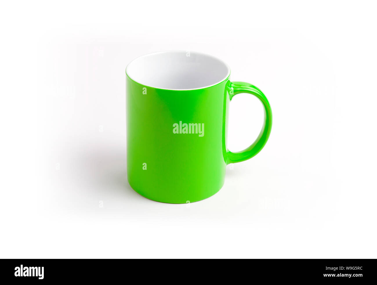 Empty Green mug on a white background Stock Photo - Alamy