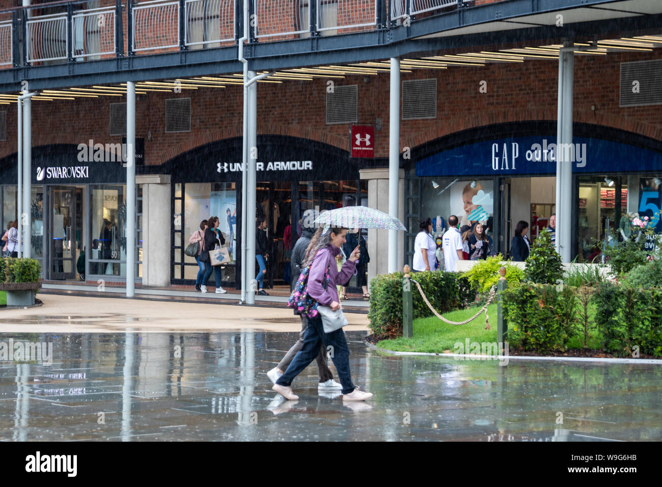 Taking shelter from bad weather hi-res stock photography and images - Alamy