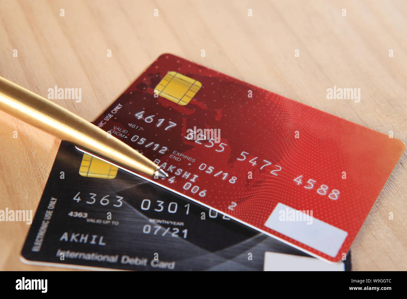 Credit cards with a pen Stock Photo - Alamy