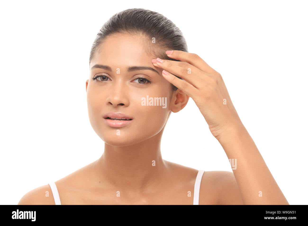 Finger forehead woman hi-res stock photography and images - Alamy