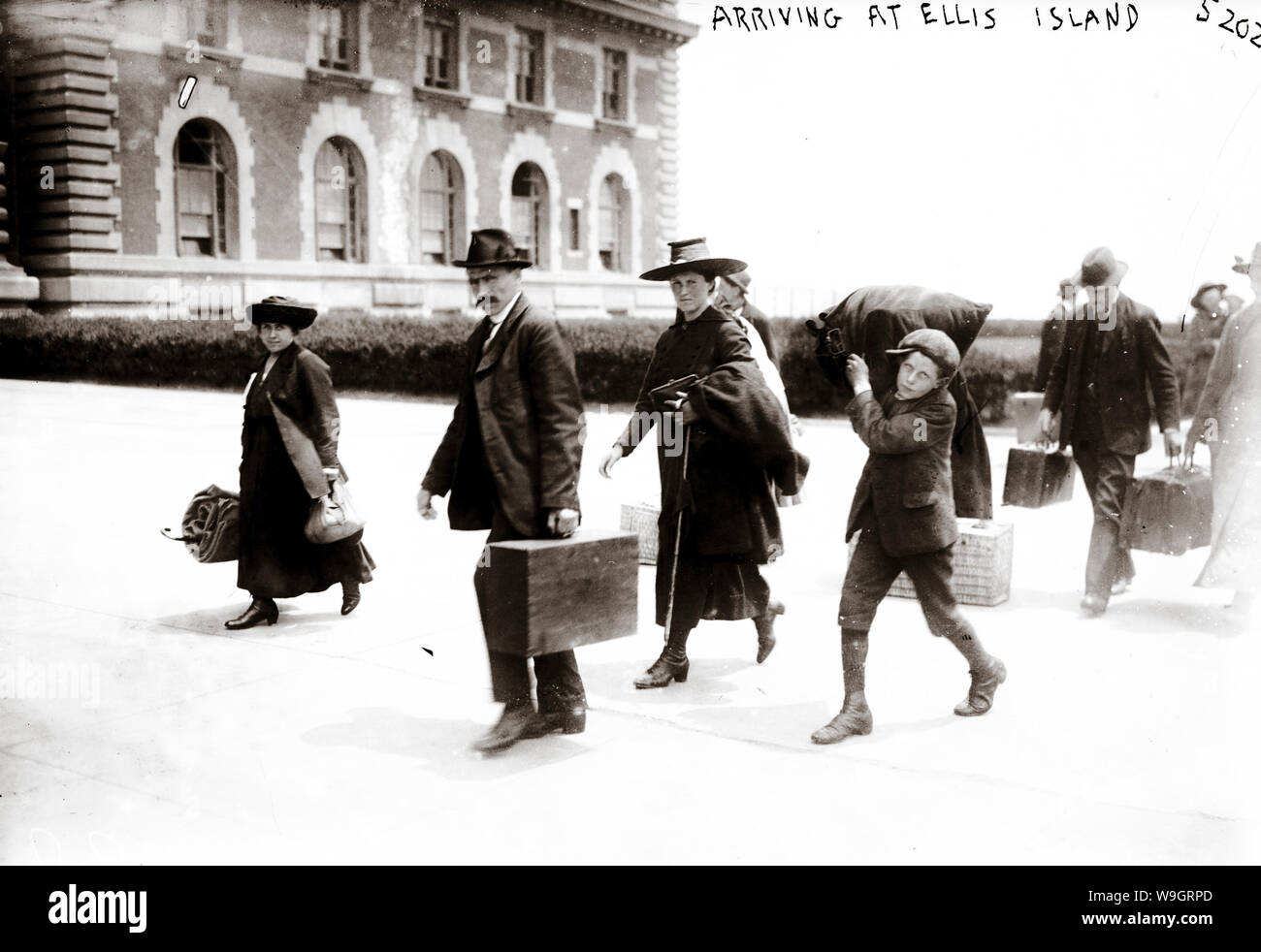 Immigrants arrive at New York's Ellis Island as they begin their ...