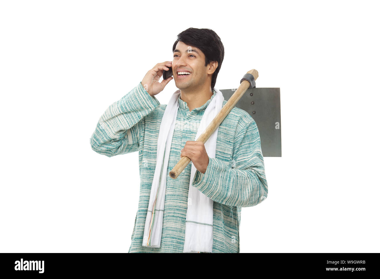 Rural man talking on mobile phone and smiling Stock Photo - Alamy