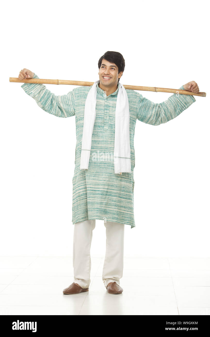 Rural man standing with his cane Stock Photo - Alamy