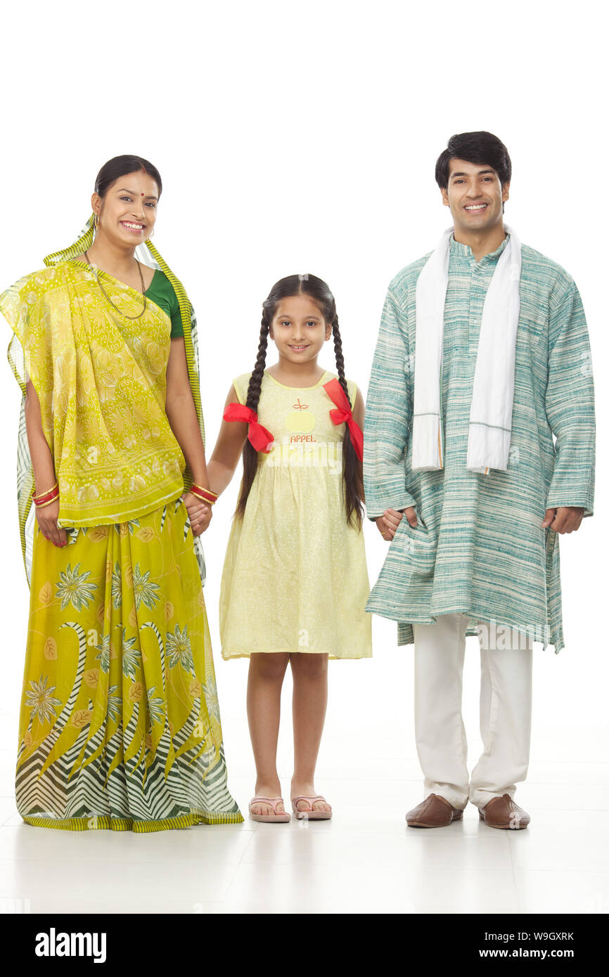 Rural family standing together and smiling Stock Photo - Alamy