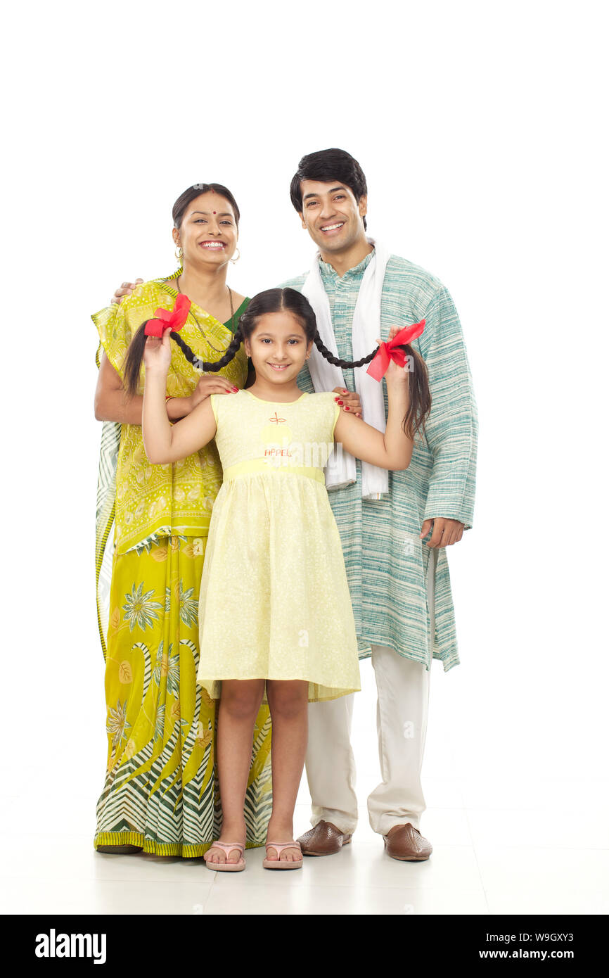 Rural family standing together and smiling Stock Photo - Alamy