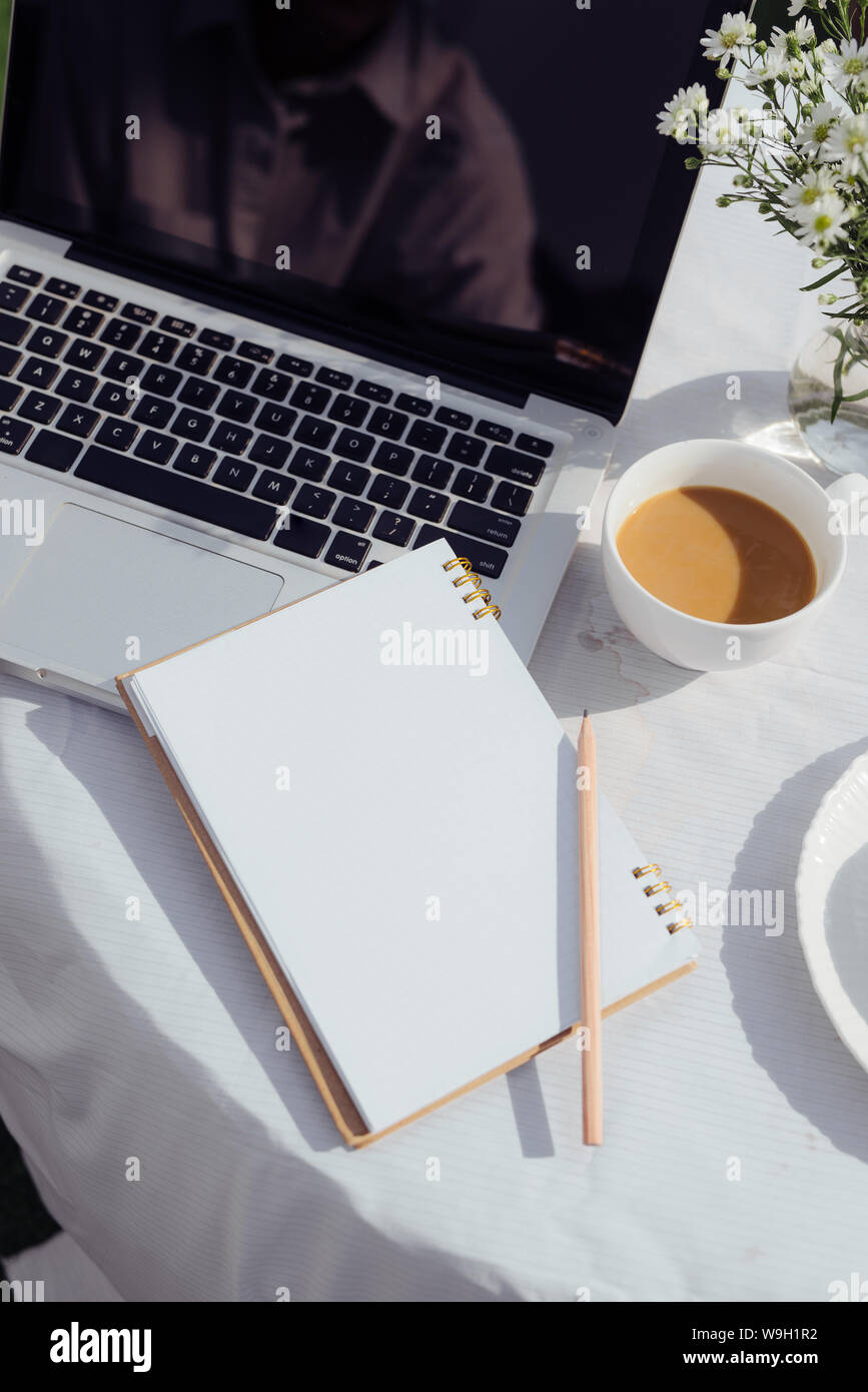 Laptop, bread and cafe in coffee shop Stock Photo - Alamy