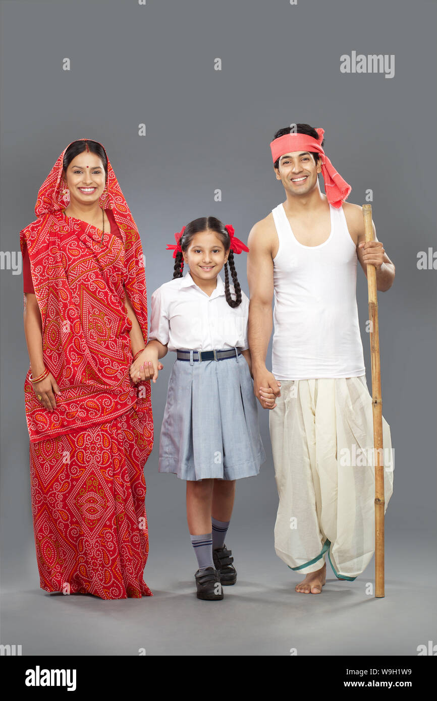 Rural family walking together and smiling Stock Photo - Alamy