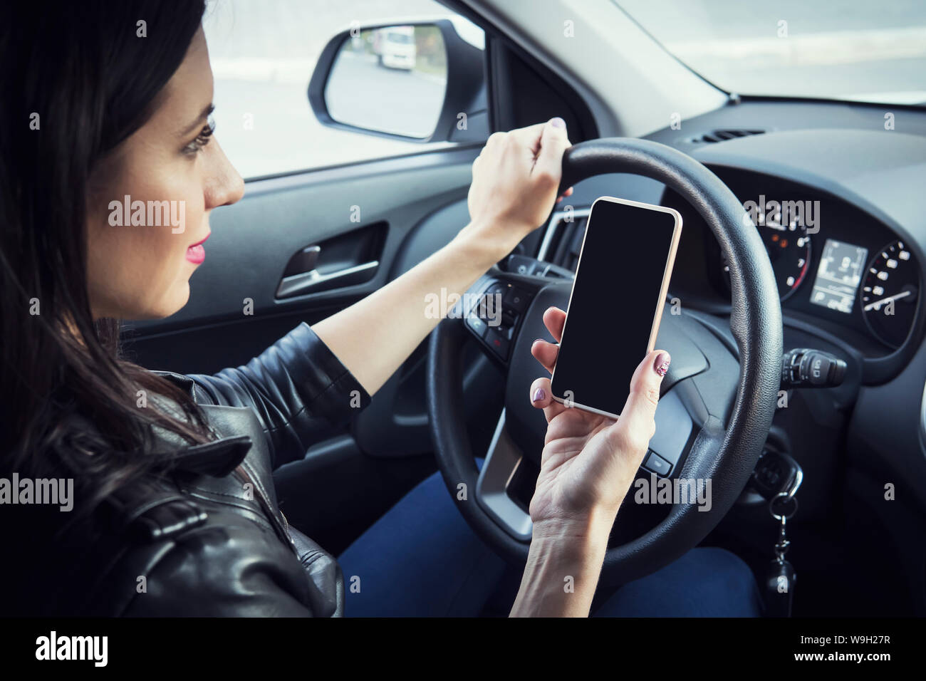 Hand holding mobile phone side on hi-res stock photography and images ...