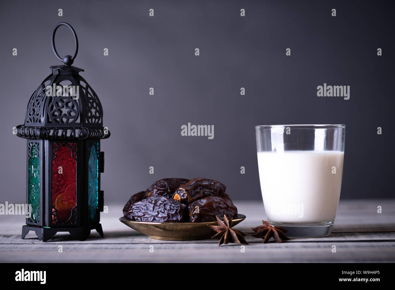 Ramadan food and drinks concept. Ramadan Lantern with Milk, dates fruit ...