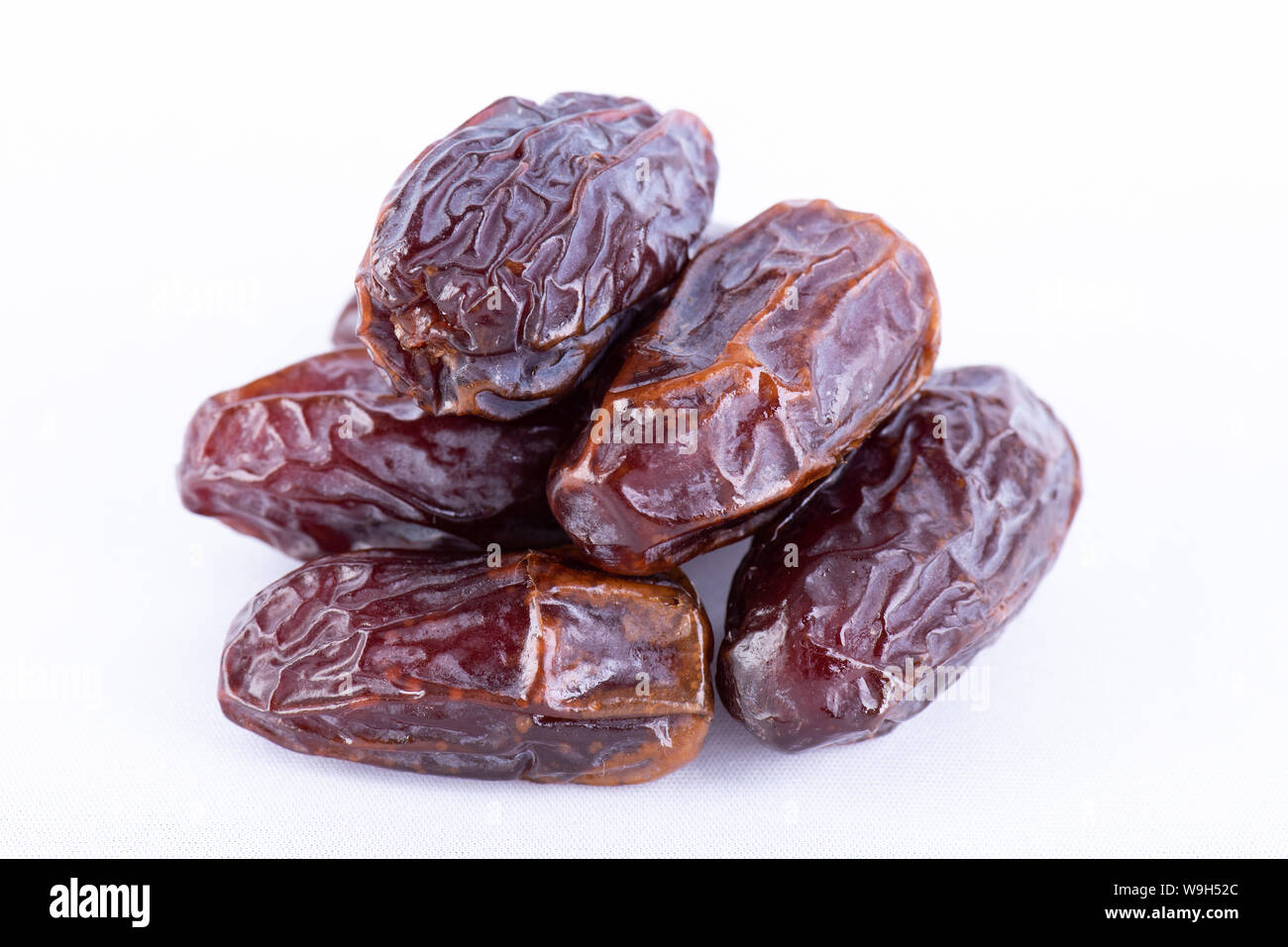 Ramadan food and drinks concept. Close up dates fruit on white ...
