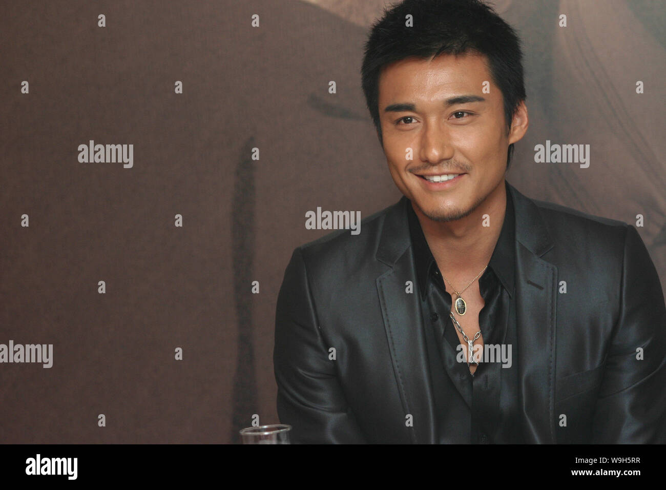 Chinese actor and model Hu Bing at the ceremony celebrating his signing ...