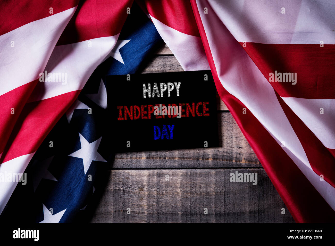 Top view of white picture frame with Flag of the United States of ...