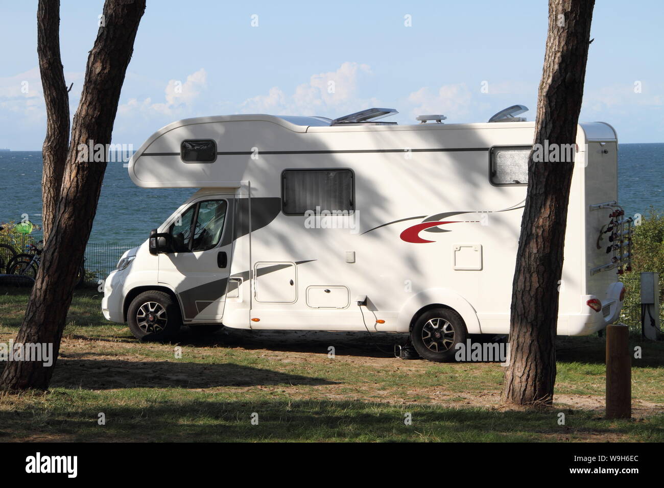 Caravan in the sunset Stock Photo - Alamy