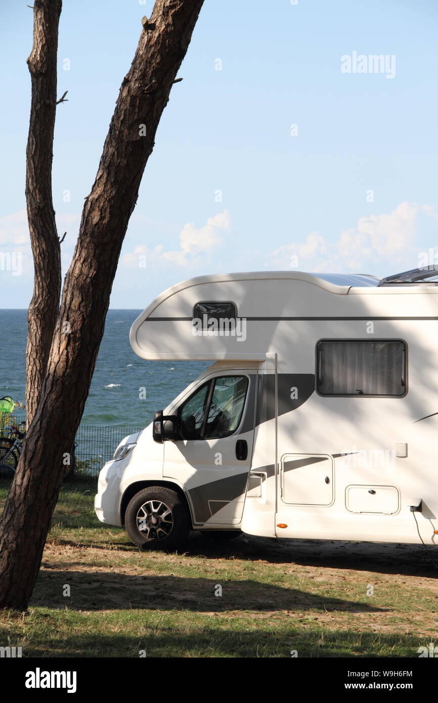 Caravan in the sunset Stock Photo - Alamy