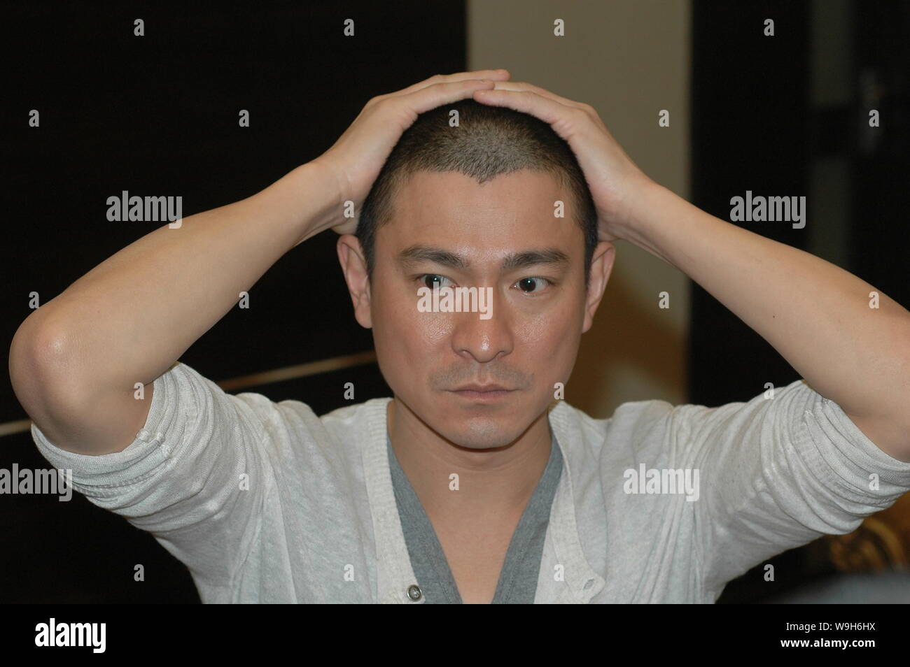 Hong Kong star Andy Lau gestures during the premiere of his latest ...