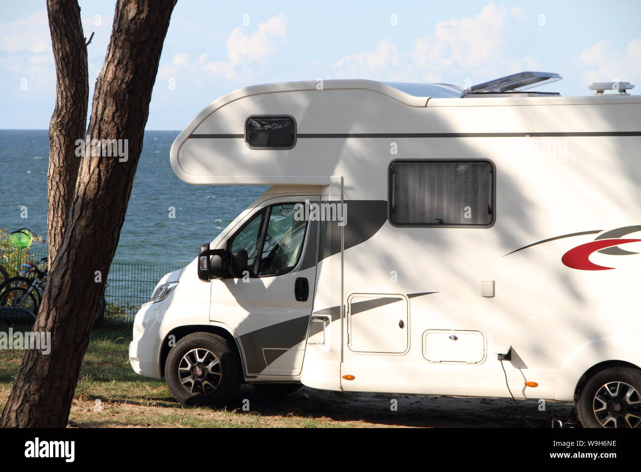 Caravan in the sunset Stock Photo - Alamy