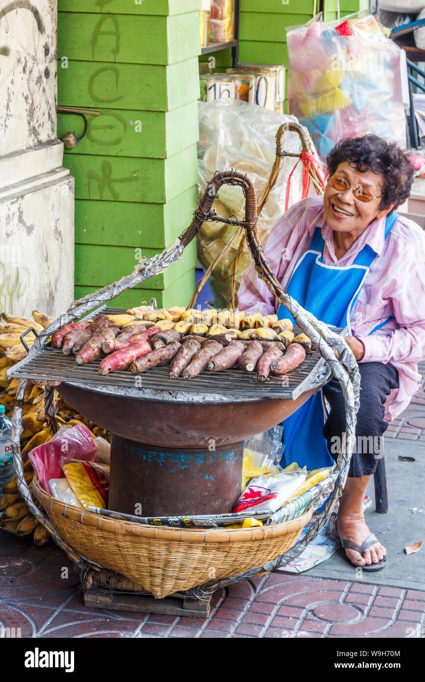 Bangkok, Thailand - 20th September 2014: Roasted sweet potatoe vendor ...