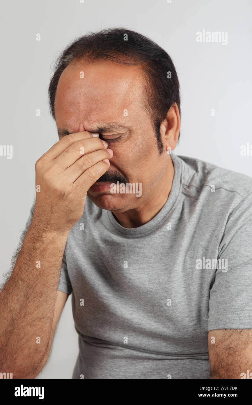Man eyes closed close up depressed hi-res stock photography and images ...