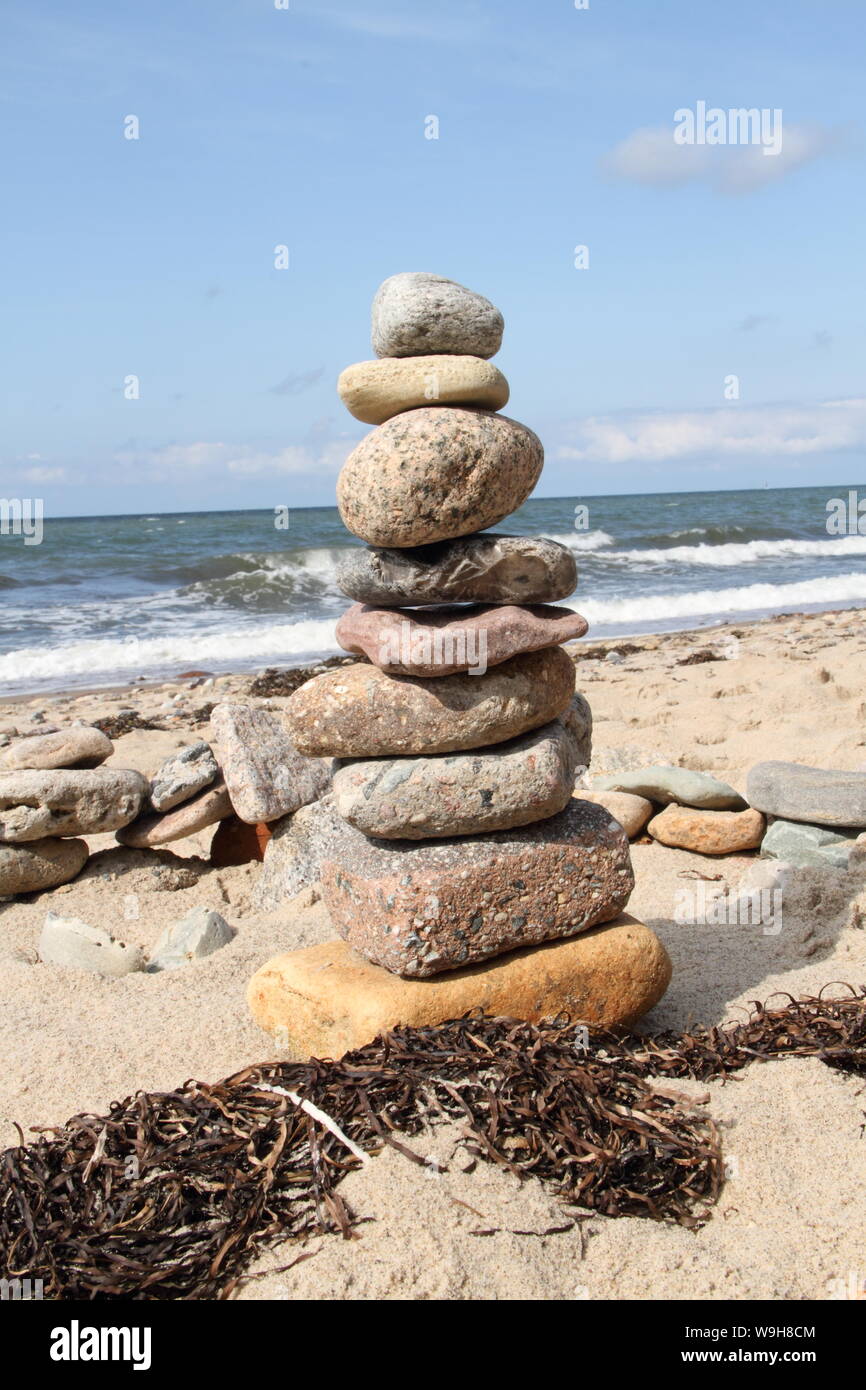 Stone pyramid on the beach Stock Photo - Alamy