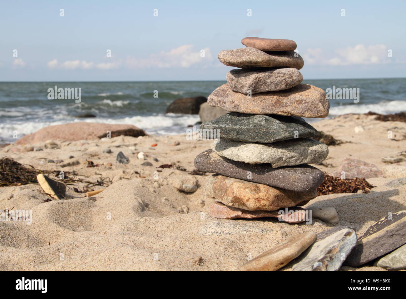 Stone pyramid on the beach Stock Photo - Alamy