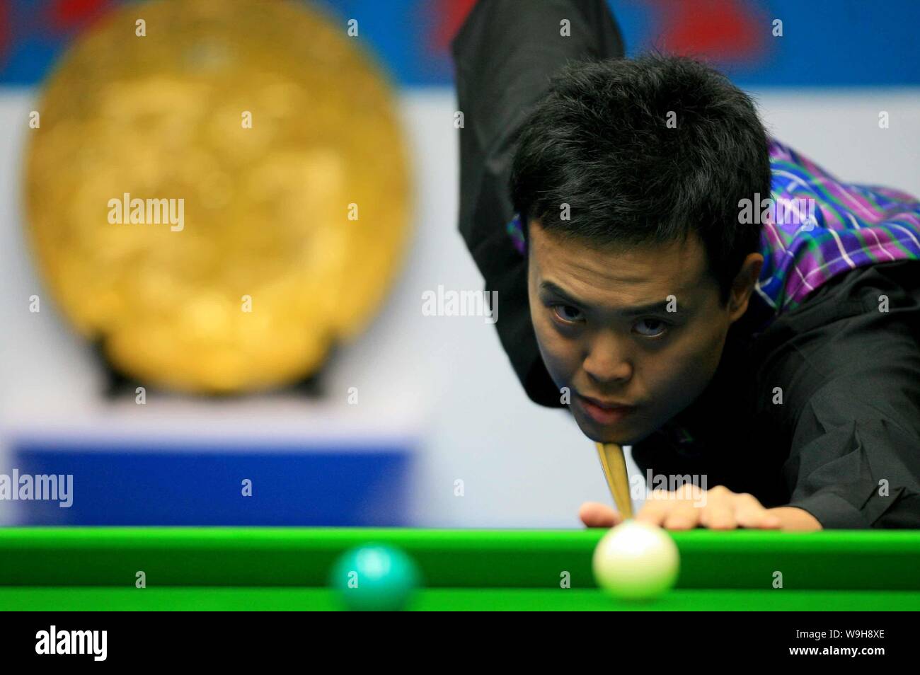 Marco Fu of Hong Kong ponders during the quarterfinal match of World ...