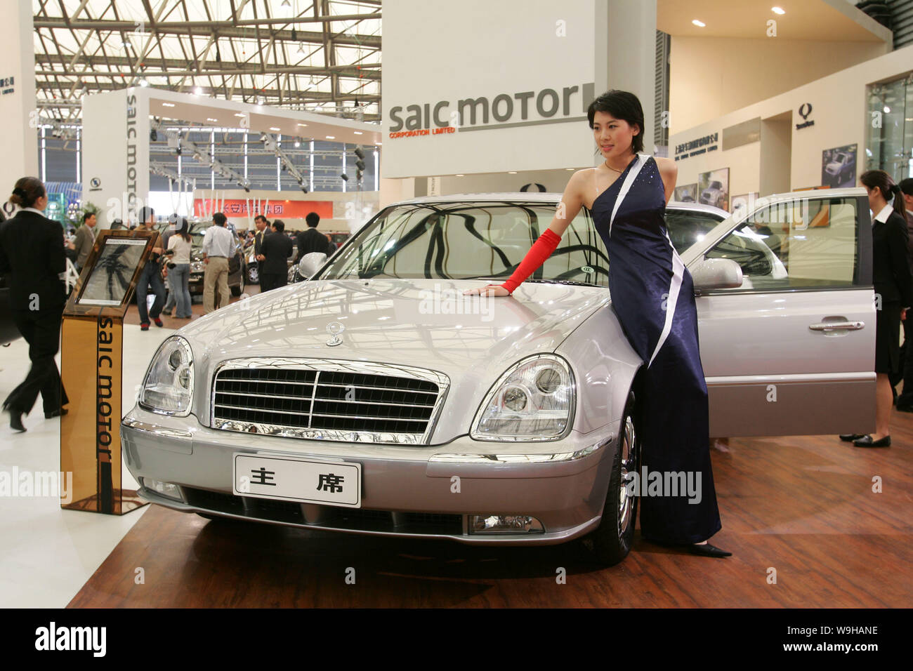 A Chinese model poses with a SSANGYONG Chairman of SAIC (Shanghai ...