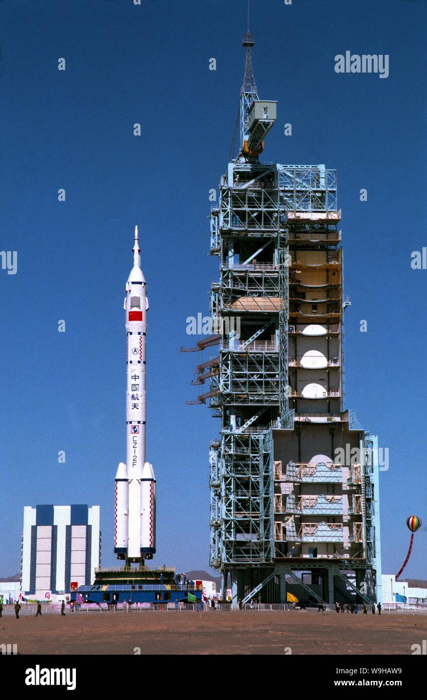 A Long March 2F (CZ-2F) rocket carrying Shenzhou V manned spacecraft is ...