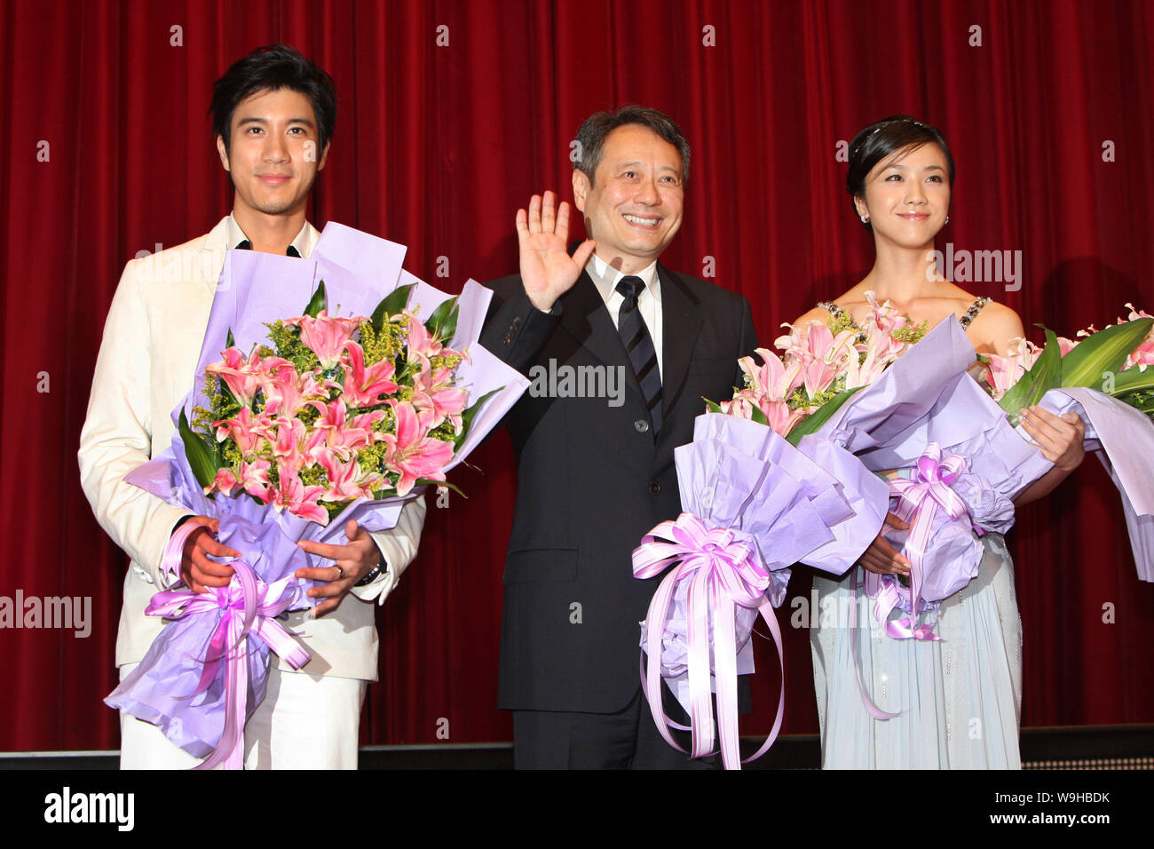 Director Ang Lee (center), poses with Chinese actress Tang Wei (right ...