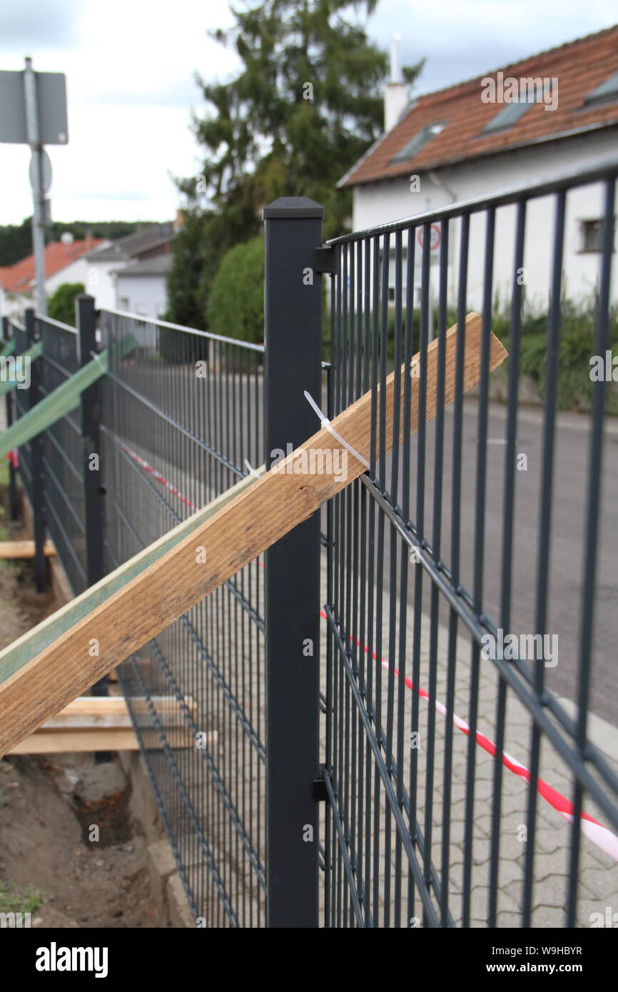 build new garden fence Stock Photo - Alamy