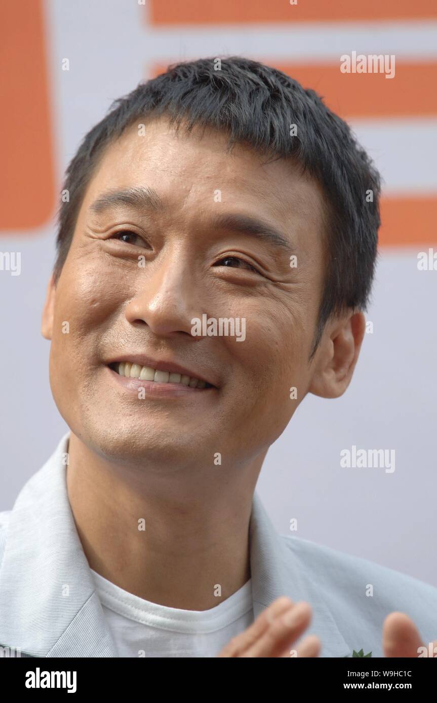 Hong Kong actor Tony Leung smiles during an environment protection ...