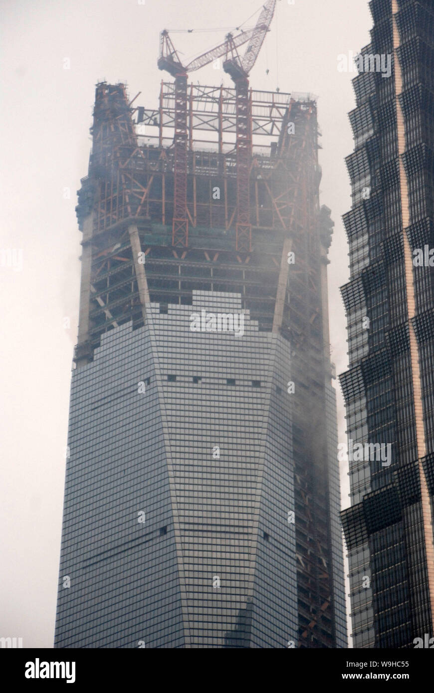 View of Shanghai World Financial Center, left, on fire near Jinmao ...