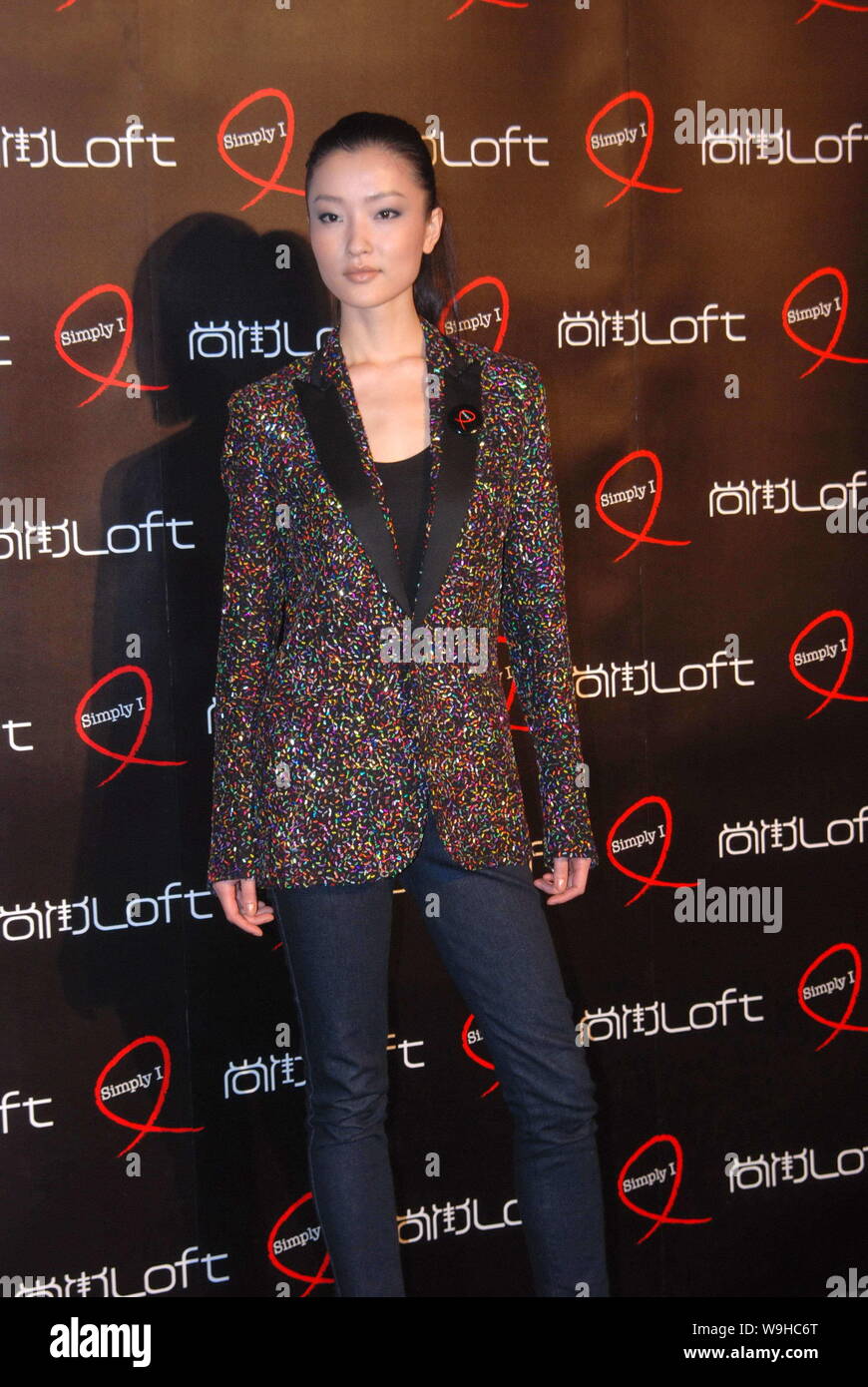 Chinese model Du Juan poses during a charity event in Shanghai ...