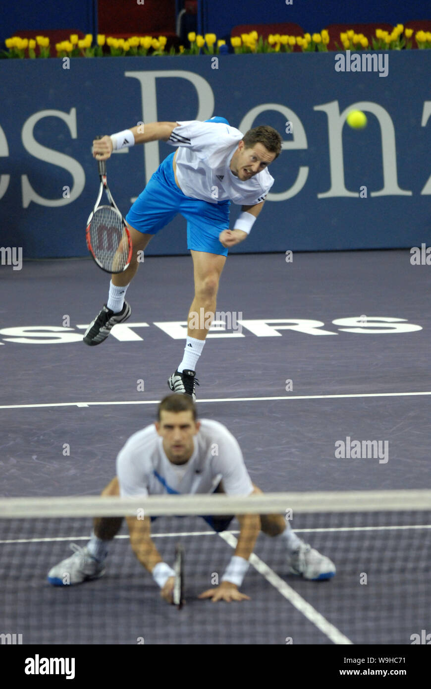 Jonas Bjorkman of Sweden, background, and Max Mirnyi, foreground, of ...