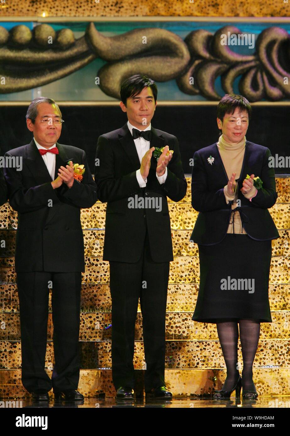 Hong Kong movie star Tony Leung (center), Hong Kong entertainment ...
